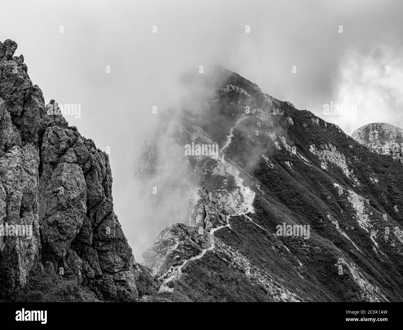 Path in the Italian alps in black and white Stock Photo - Alamy