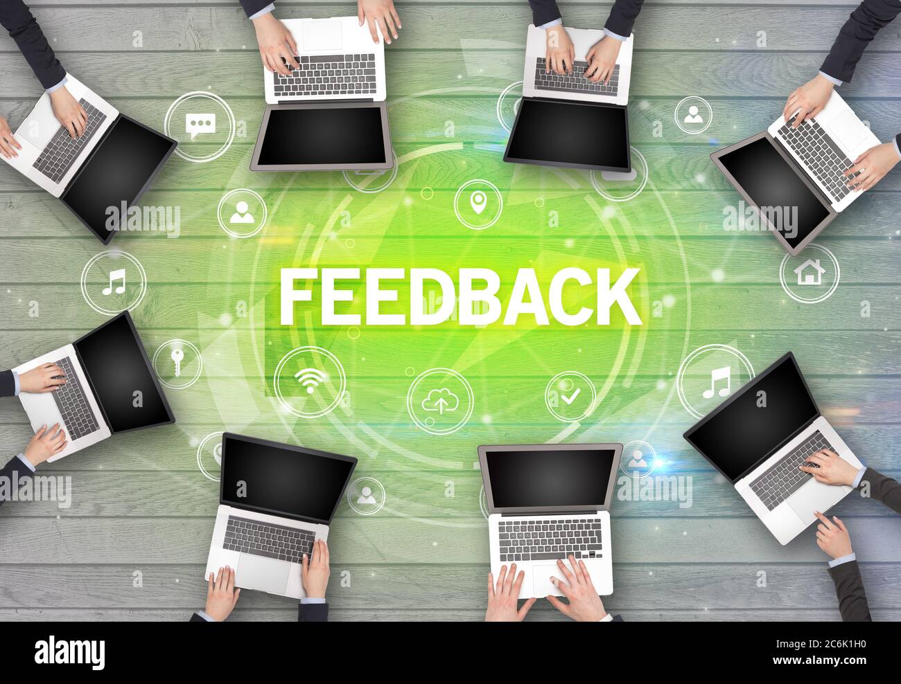 Group of people having a meeting with FEEDBACK insciption, social ...