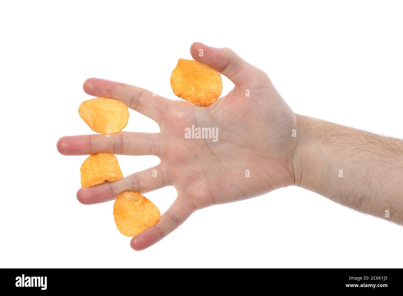 Male hand holding potato chips. Isolated on white background. High ...