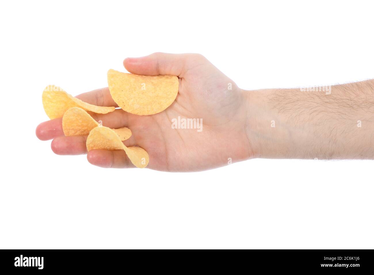 Male hand holding potato chips. Isolated on white background. High ...