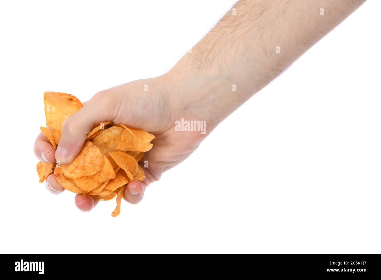 Male hand holding potato chips. Isolated on white background. High ...
