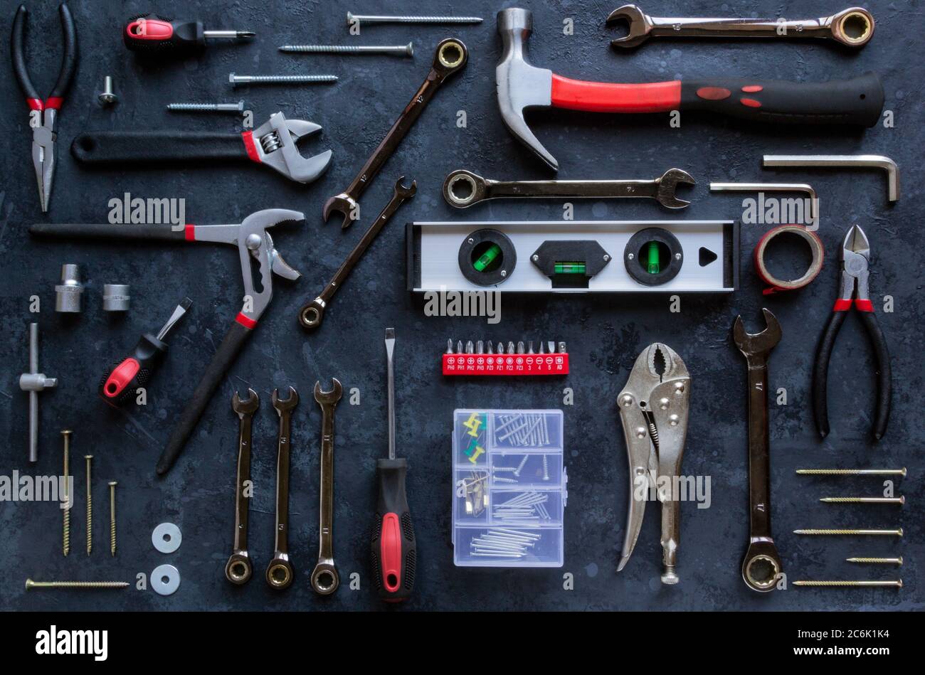 Flat lay composition with Working mechanic hand tools on grey brutal ...