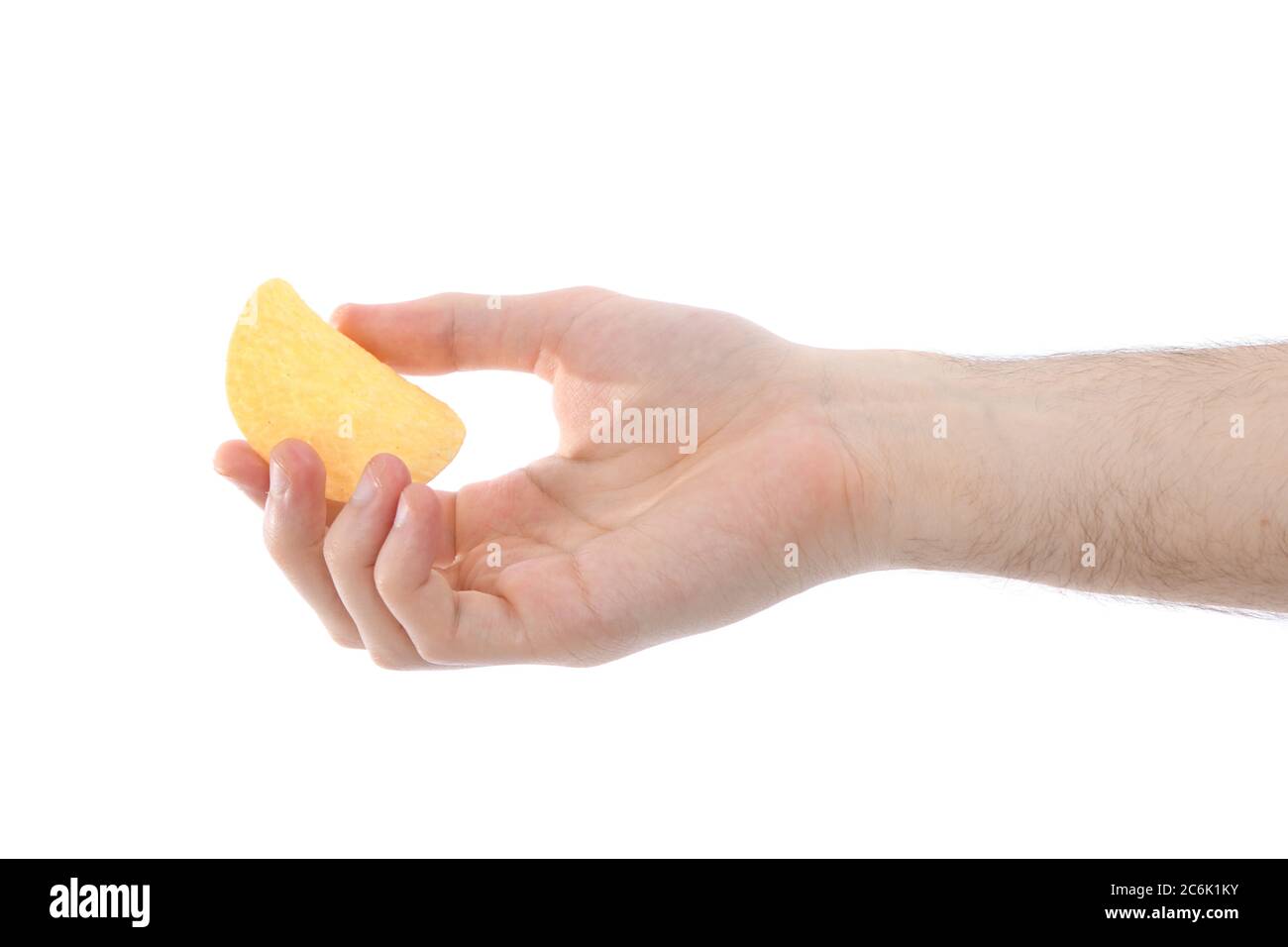 Male hand holding potato chip. Isolated on white background. High ...