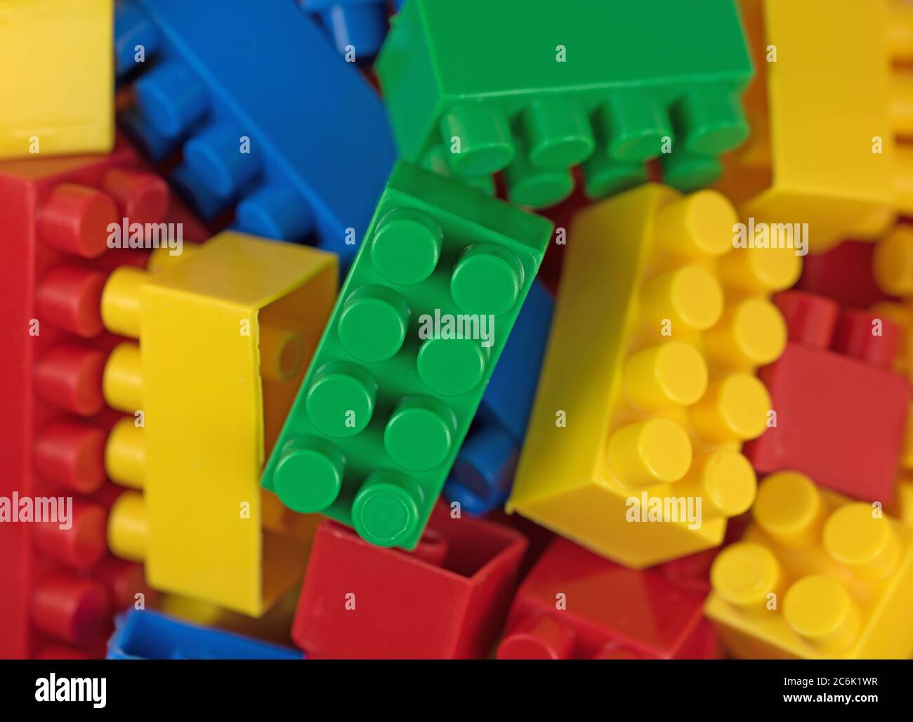 Many colorful plastic building blocks Stock Photo - Alamy