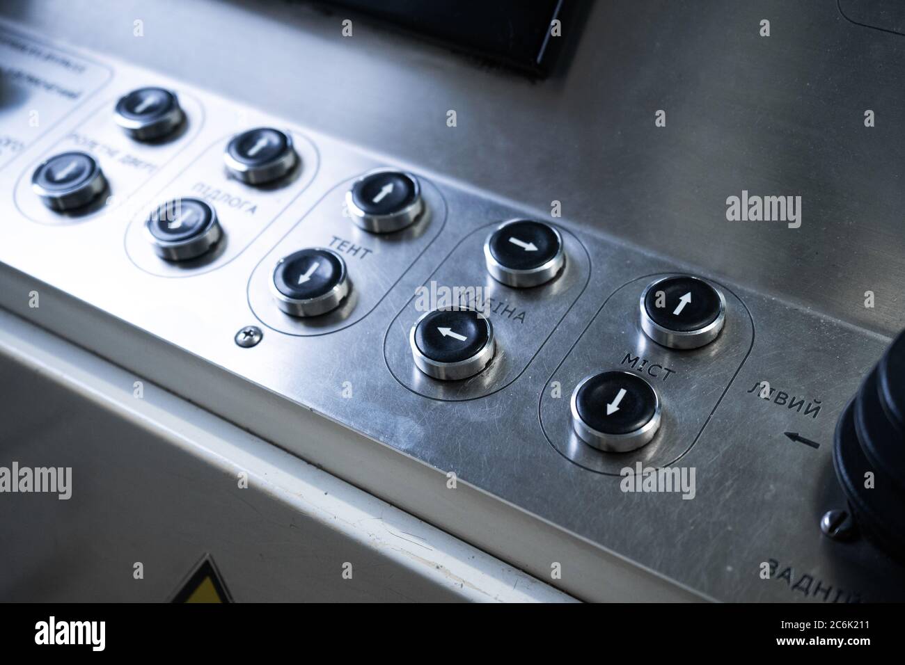 Jet bridge control panel. Round buttons on airwalk bridge control panel ...