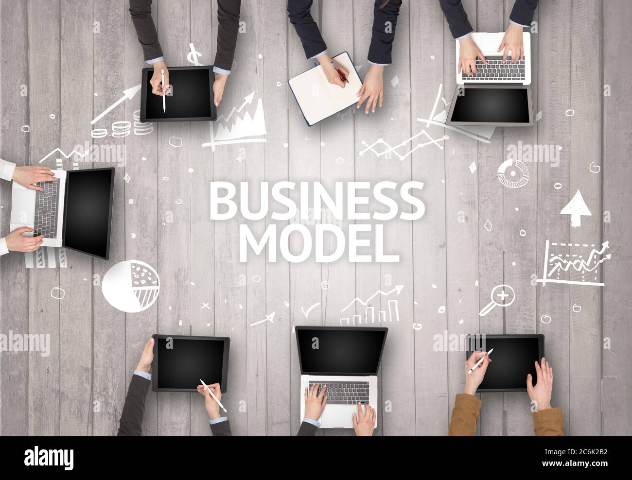 Group of Busy People Working in an Office with BUSINESS MODEL ...