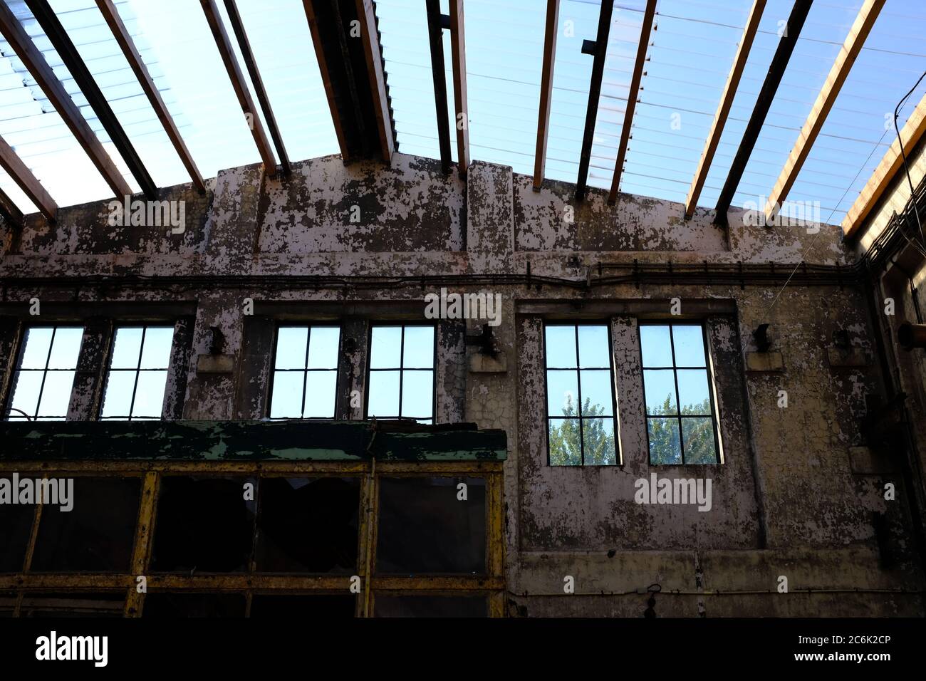The interior of an abandoned industrial warehouse building on old ...