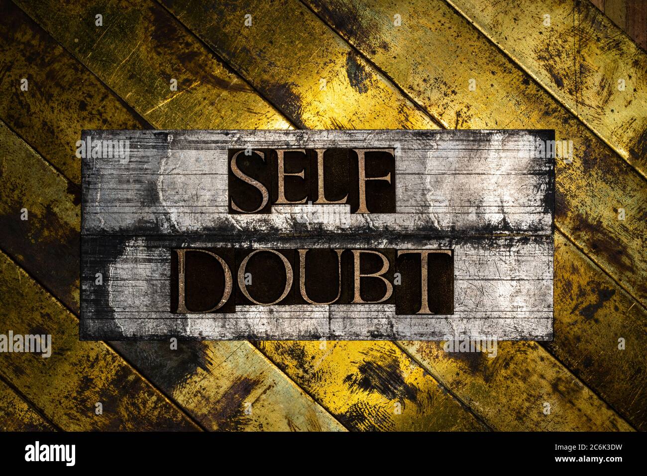 Self Doubt text formed with real authentic typeset letters on vintage ...