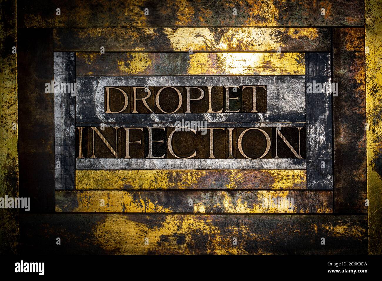 Droplet Infection text formed with real authentic typeset letters on ...