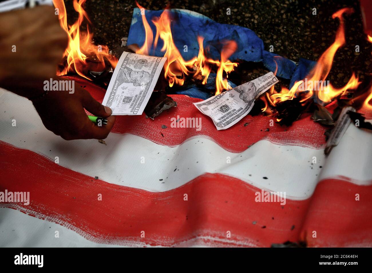 Awkar, Lebanon. 10th July, 2020. Demonstrators throw printed copies of ...