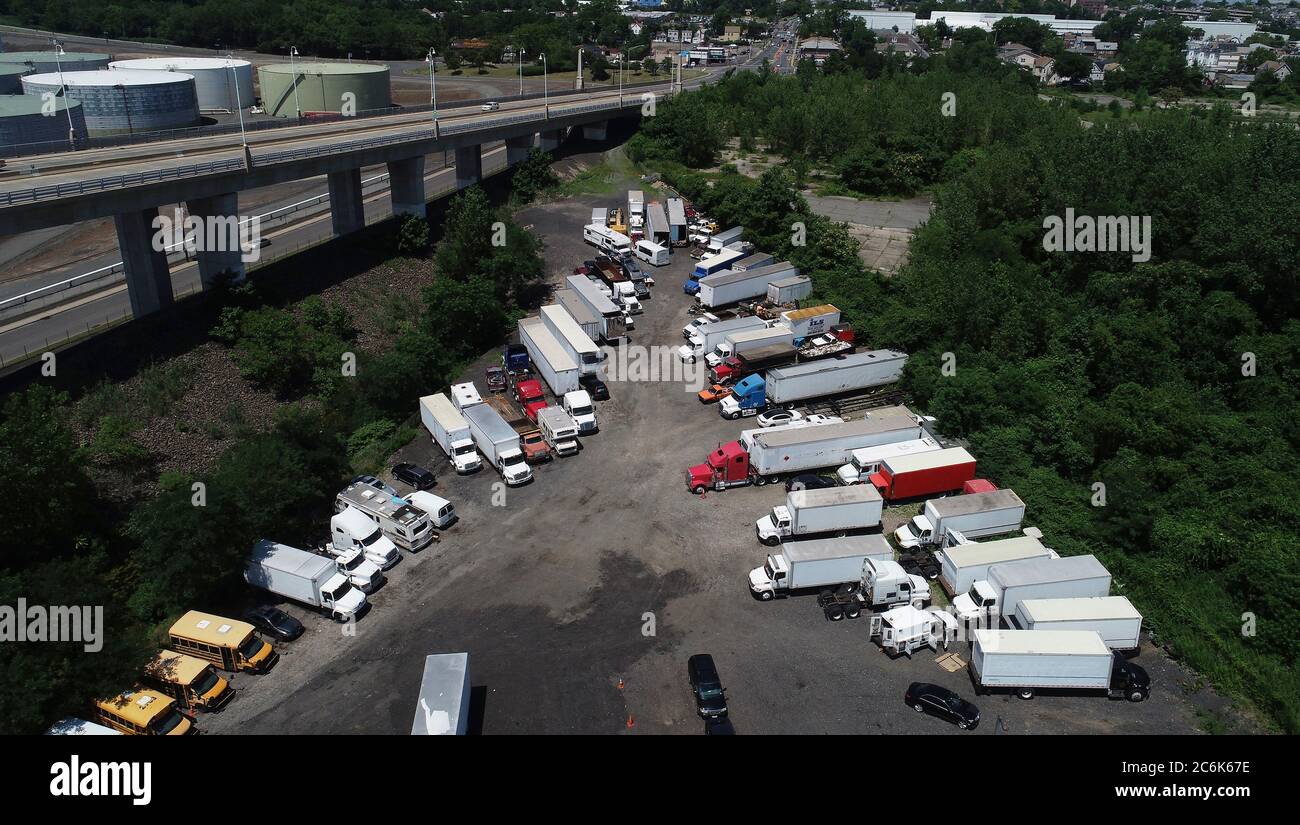 Aerial view of Victory Bridge leading into Perth Amboy, NJ with trucks ...