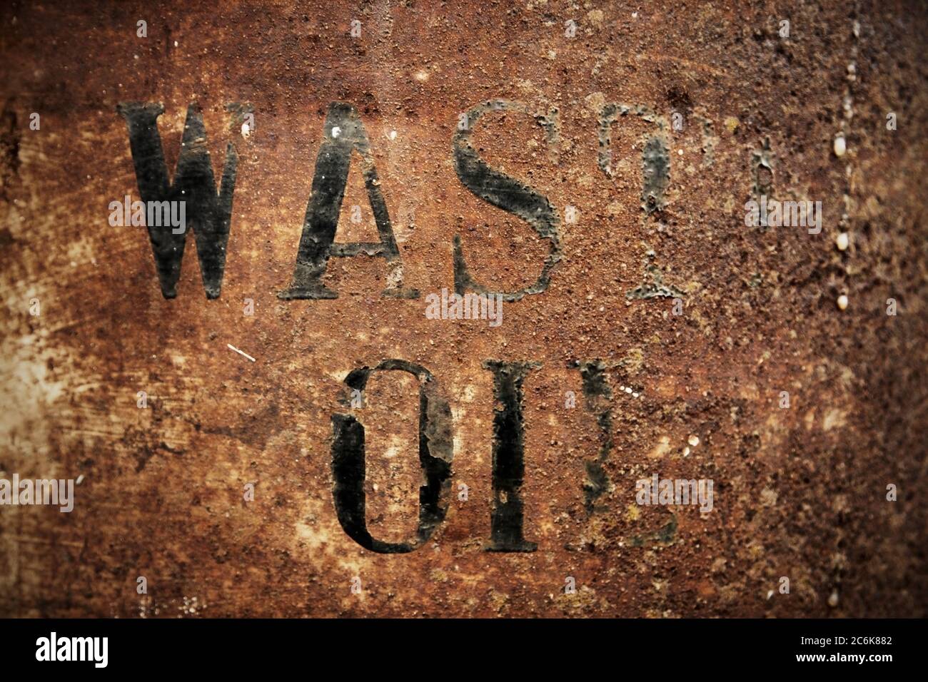 Oil rusty steel drum used for waste oil collection Stock Photo - Alamy