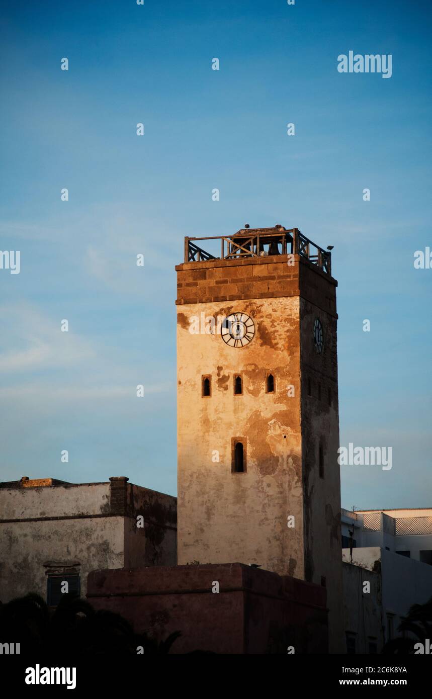Old clock tower in Essaouira, Morocco Stock Photo - Alamy