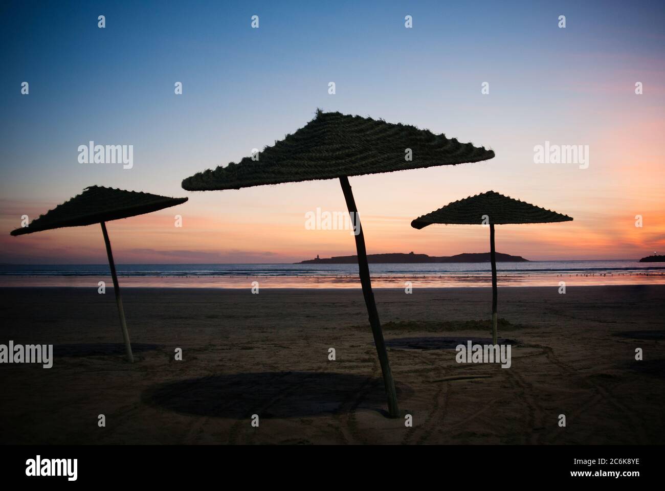 Sunset on beach parasol hi-res stock photography and images - Alamy