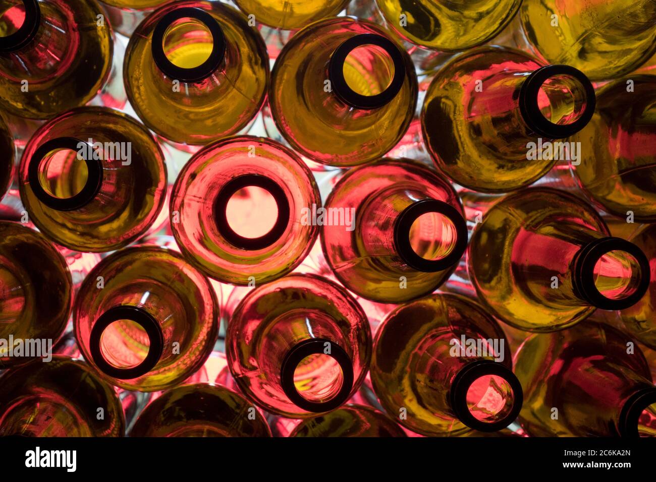 red glass empty beer bottles lie in rows Stock Photo - Alamy