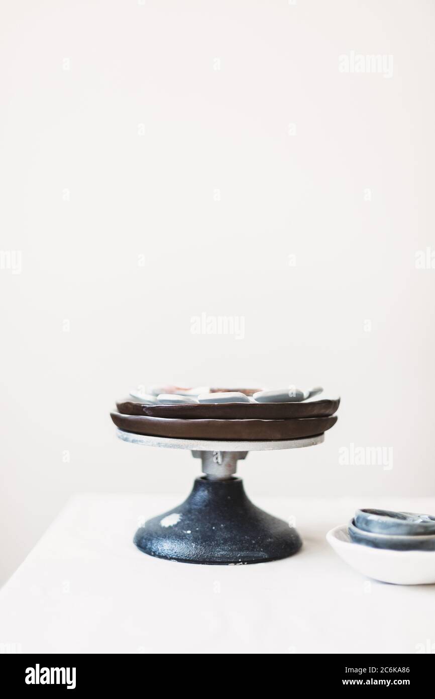 Close up handmade stand at pottery studio isolated Stock Photo - Alamy