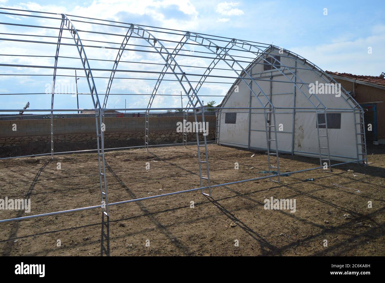 tent installation in the village Stock Photo - Alamy