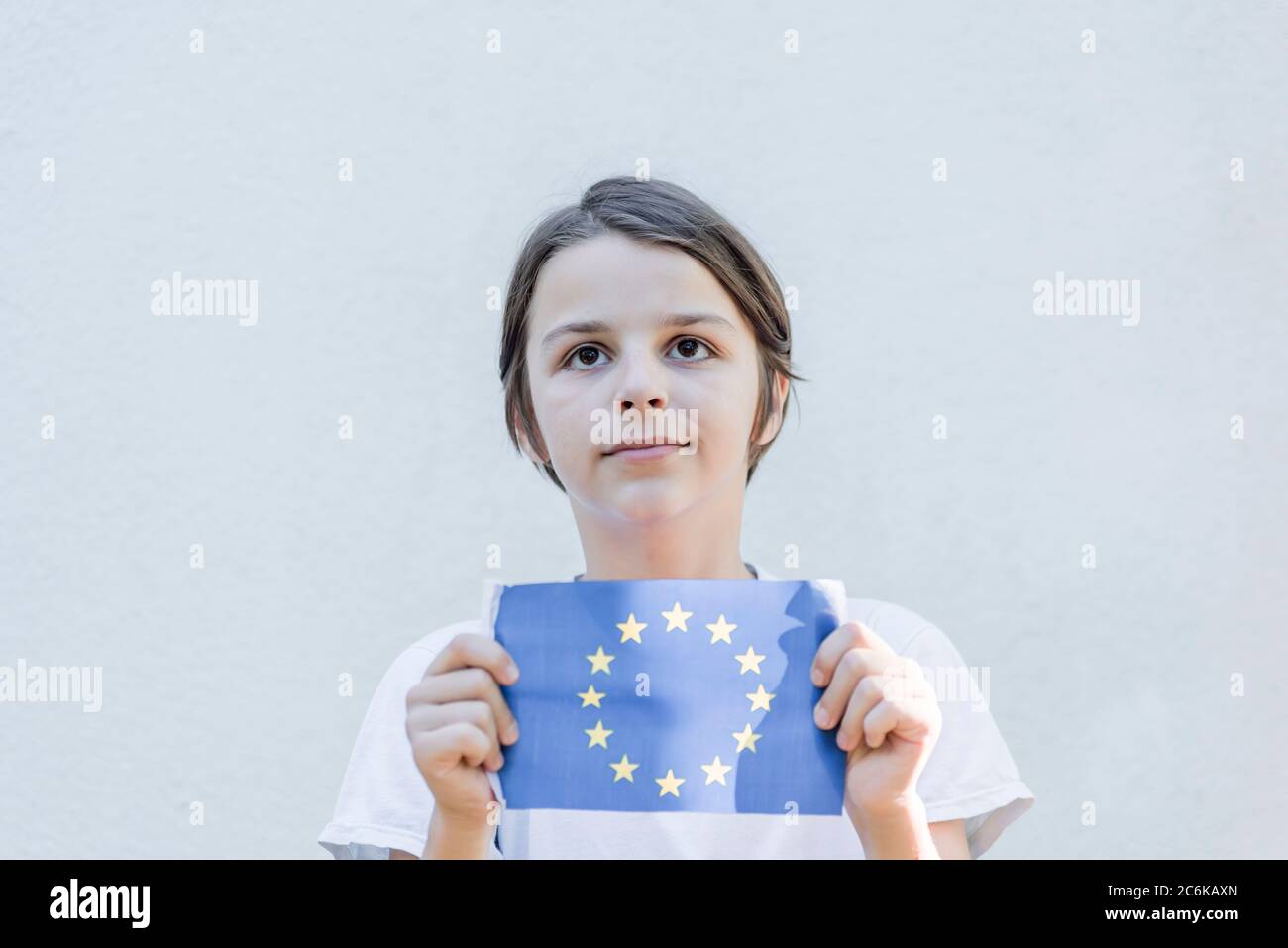boy holding a flag of European Union isolated on white background Stock ...