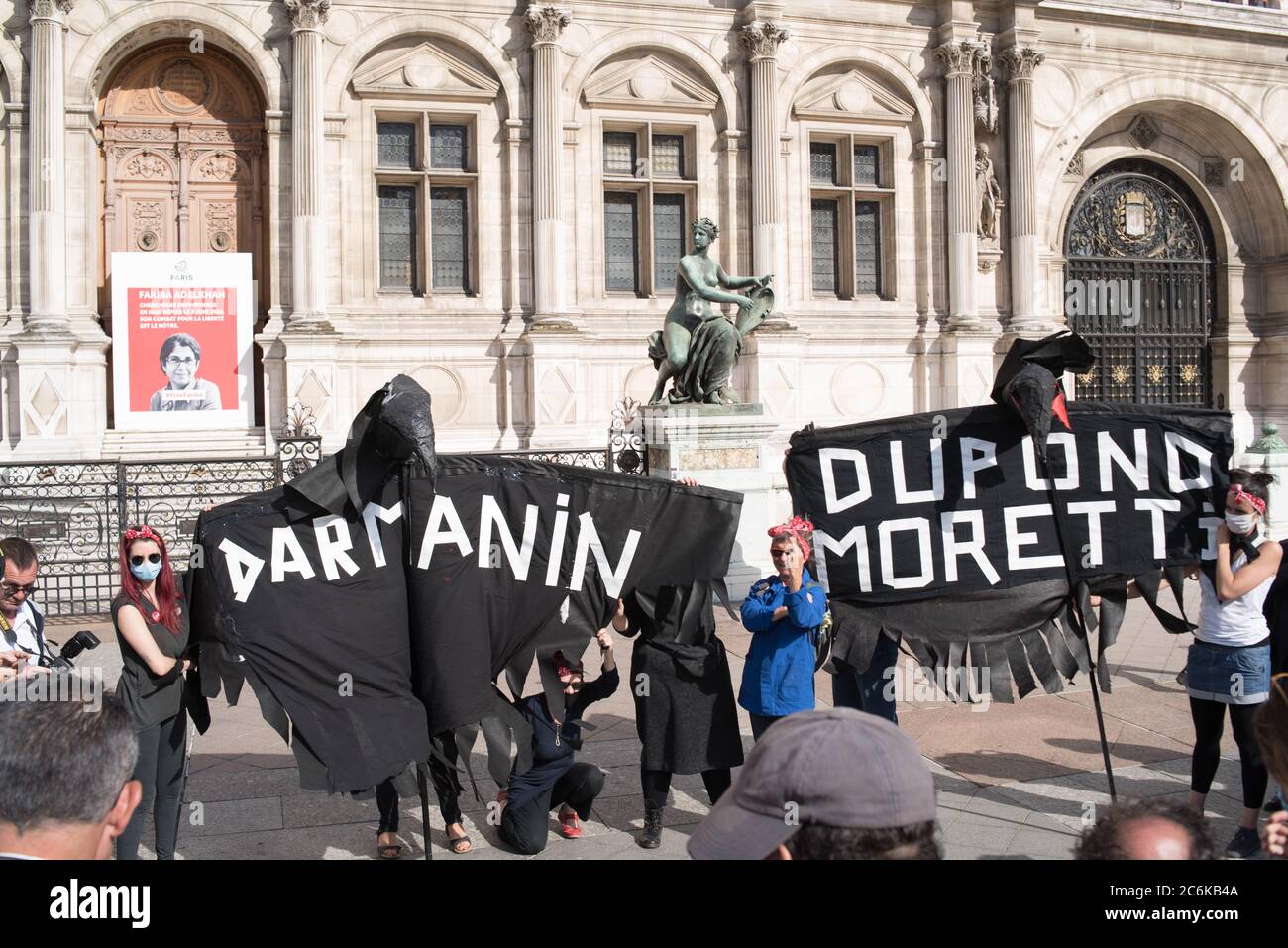Feminist rally outside City Hall in Paris to protest against two new ...