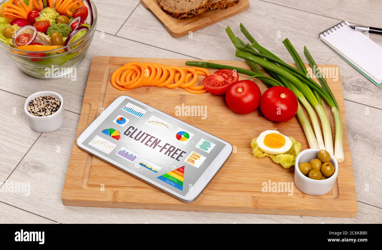 Organic food and tablet pc showing GLUTEN-FREE inscription, healthy ...
