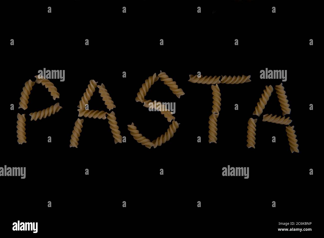 The word PASTA written with pasta screws across the centre of ...