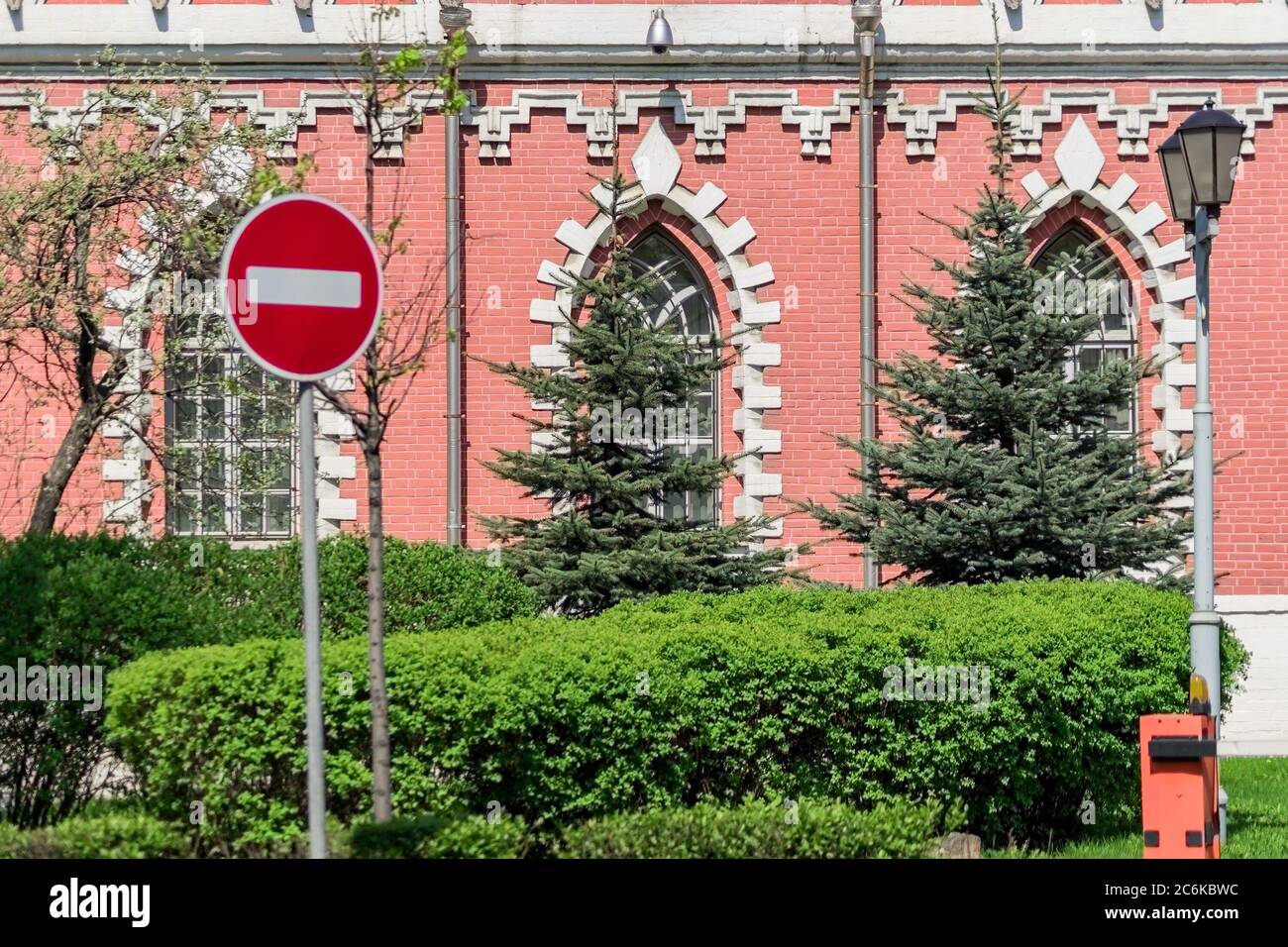 Red circular No Entry Stop sign with white horizontal line on brick ...