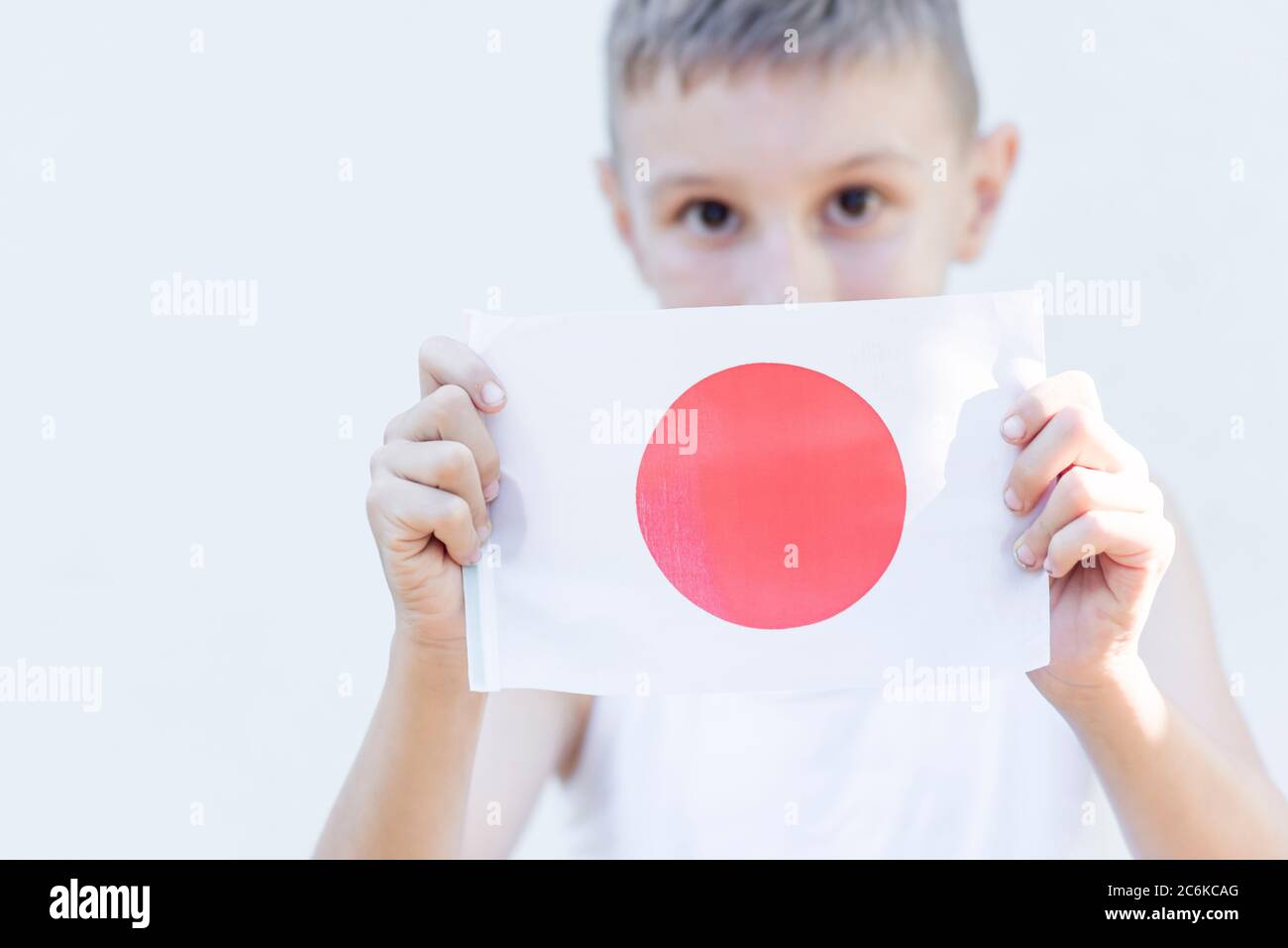 Child holding chinese national flag hi-res stock photography and images ...