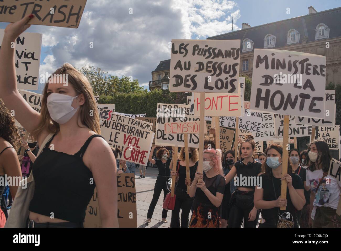 Feminist rally outside City Hall in Paris to protest against two new ...