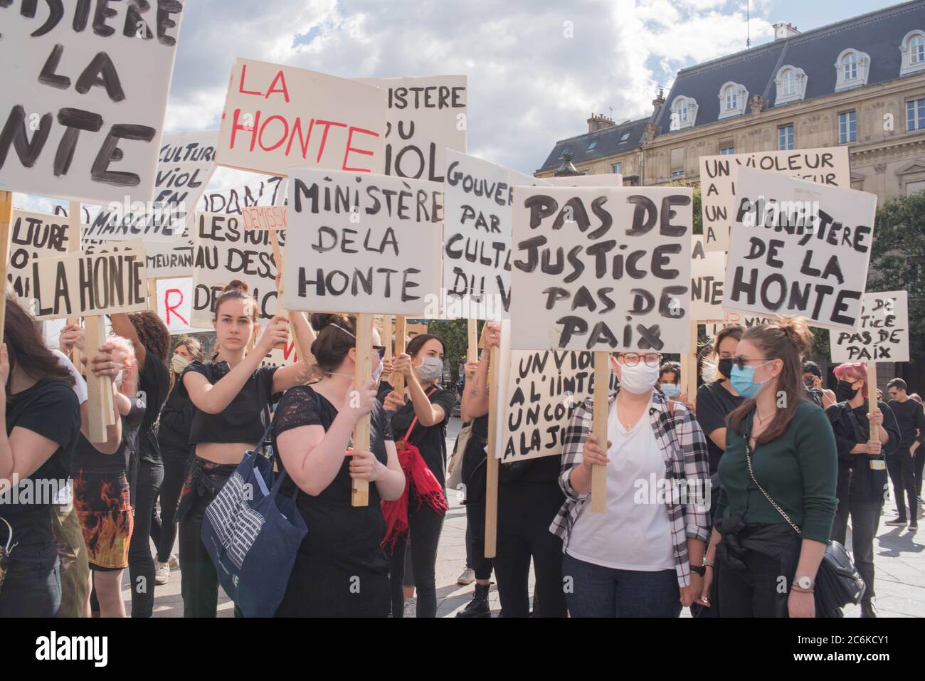 Feminist rally outside City Hall in Paris to protest against two new ...