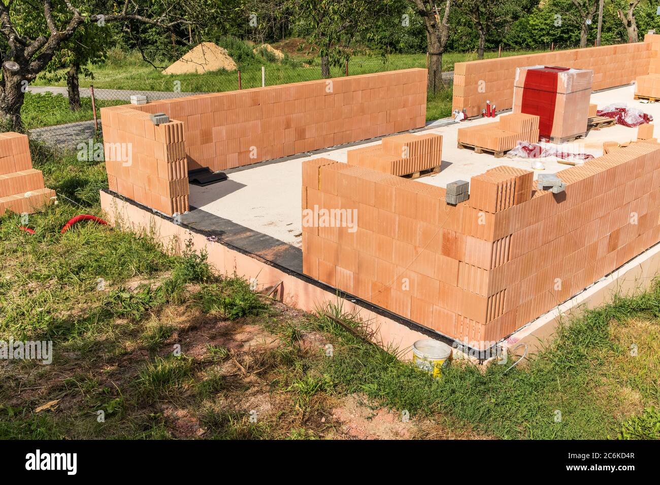 Construction of a small family house. House construction site. Brick ...