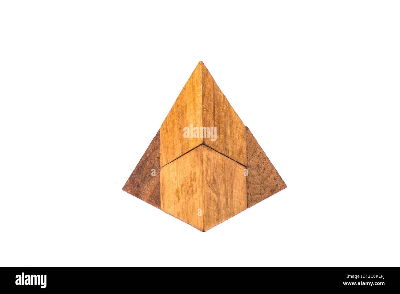 Four-piece pyramid. Wooden puzzle isolated on white background. Copy ...