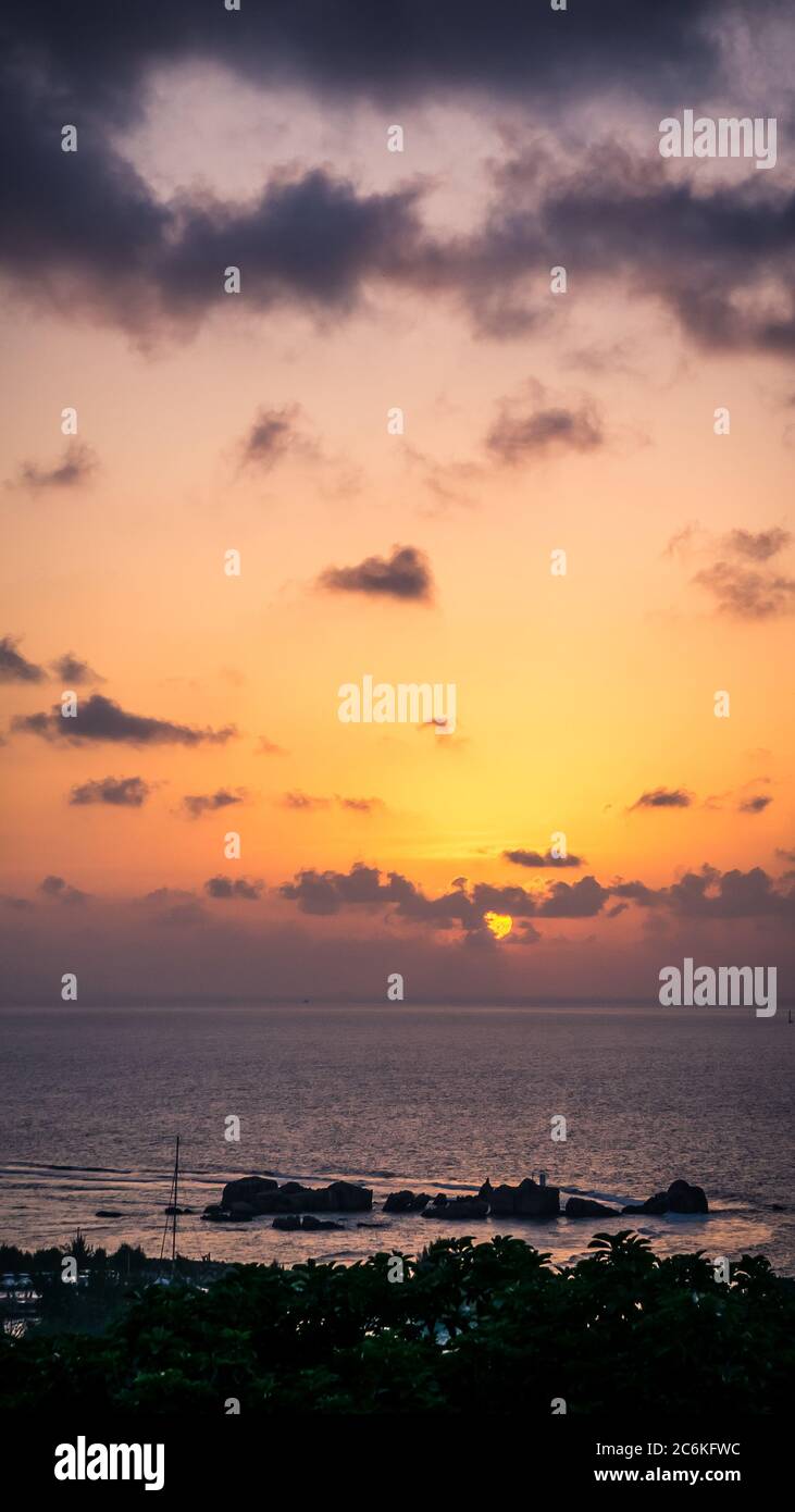 Seascape during sundown. Beautiful natural seascape with rocks in the ...