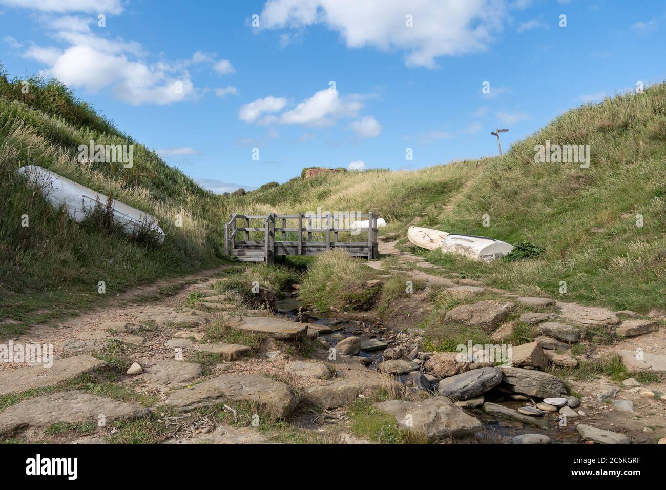 Landscape photo of the river Eype flowing into the sea at Eype Mouth in ...