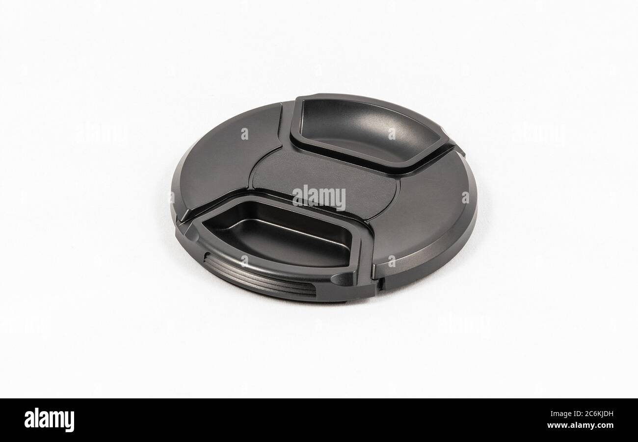 Black unbranded DSLR lens cap, isolated on white background Stock Photo ...