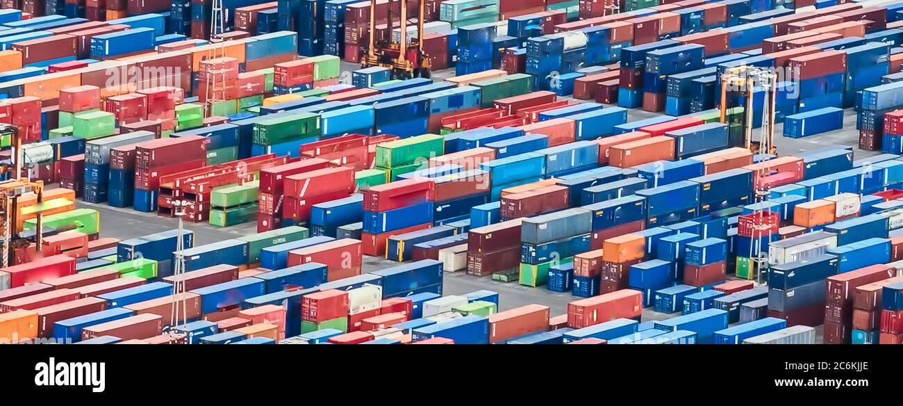 Texture made with an aerial view over shipping cargo containers stacked ...