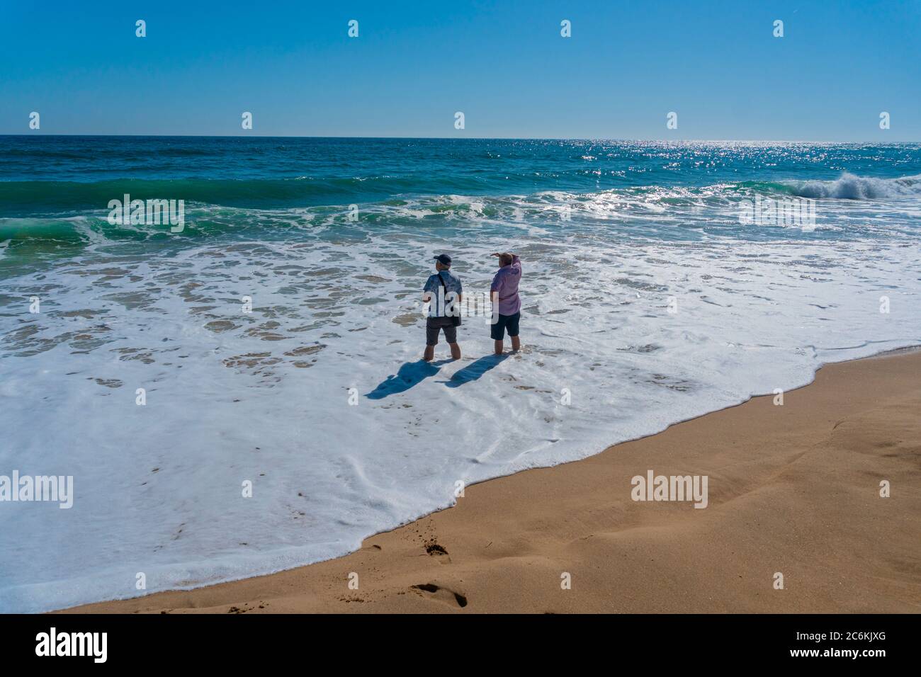 Man standing looking out bay hi-res stock photography and images - Alamy