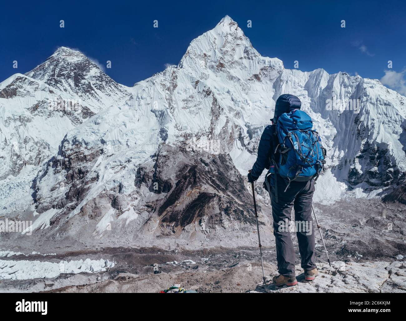 Young hiker backpacker female taking brake in hike walking enjoying ...