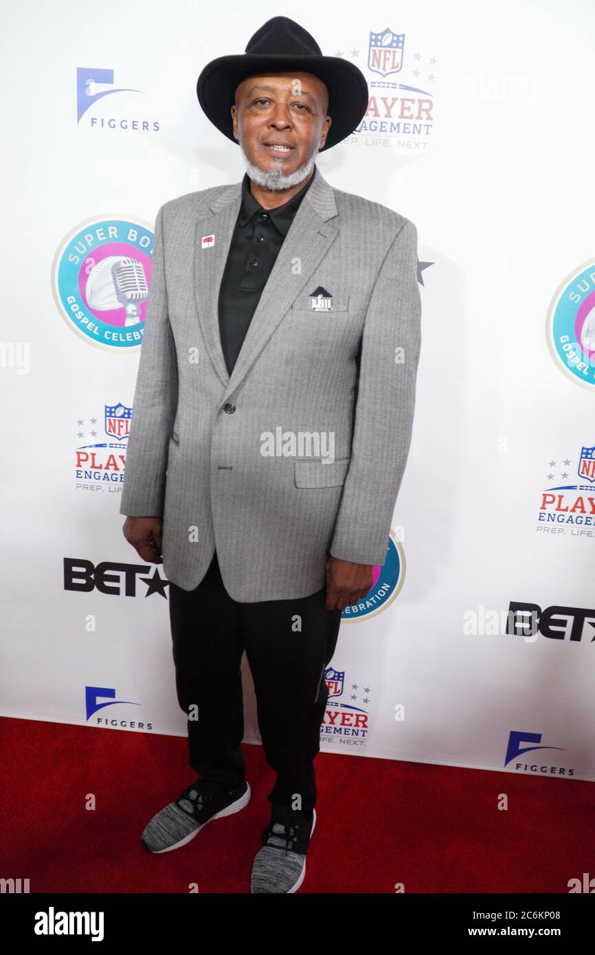 Larry Mallory pose for pictures during the 21st Annual Super bowl ...