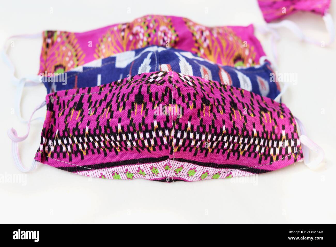 Colorful DIY fabric masks on white background. Concept for protect from ...