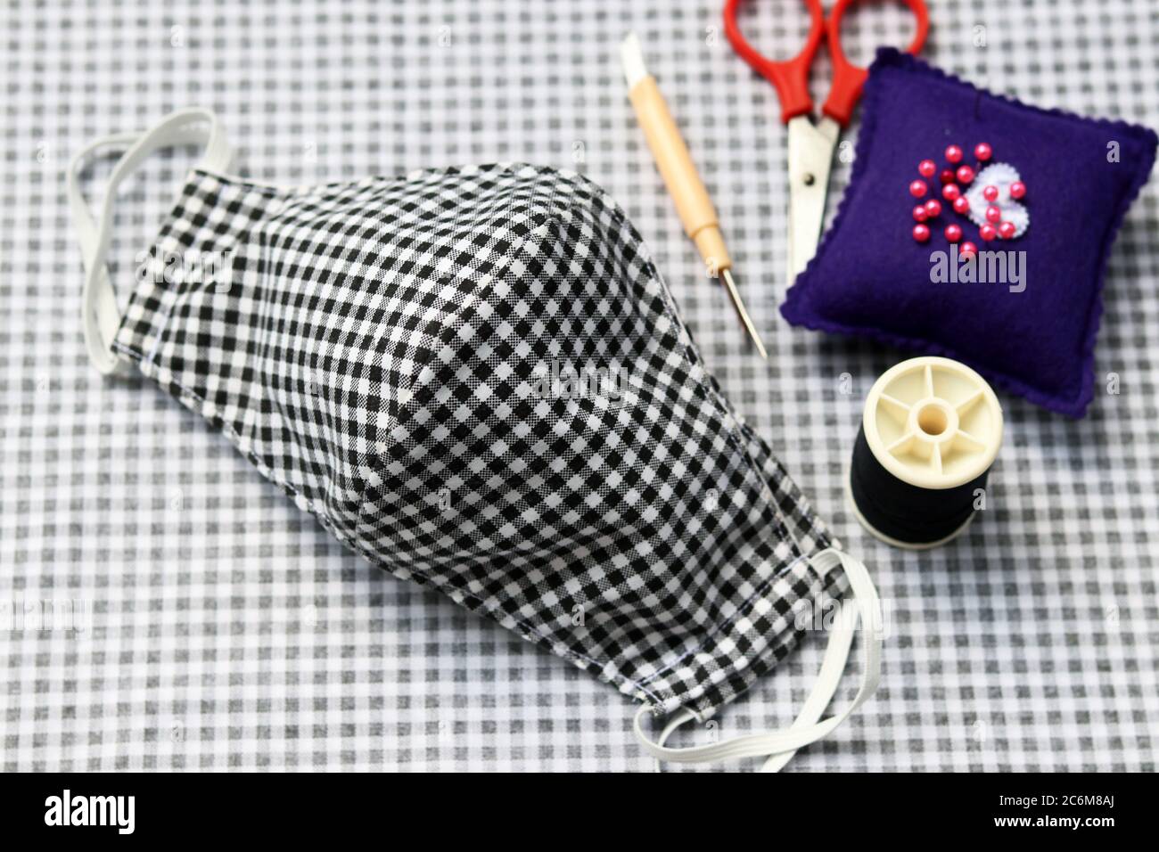 Sewing DIY cloth face mask to prevent the spread of covid-19 virus and ...