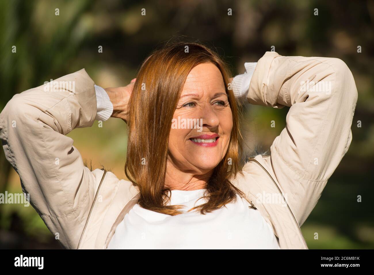 Arms behind neck hi-res stock photography and images - Alamy