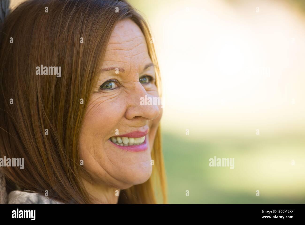 Portrait attractive beautiful senior woman sitting happy relaxed, with ...
