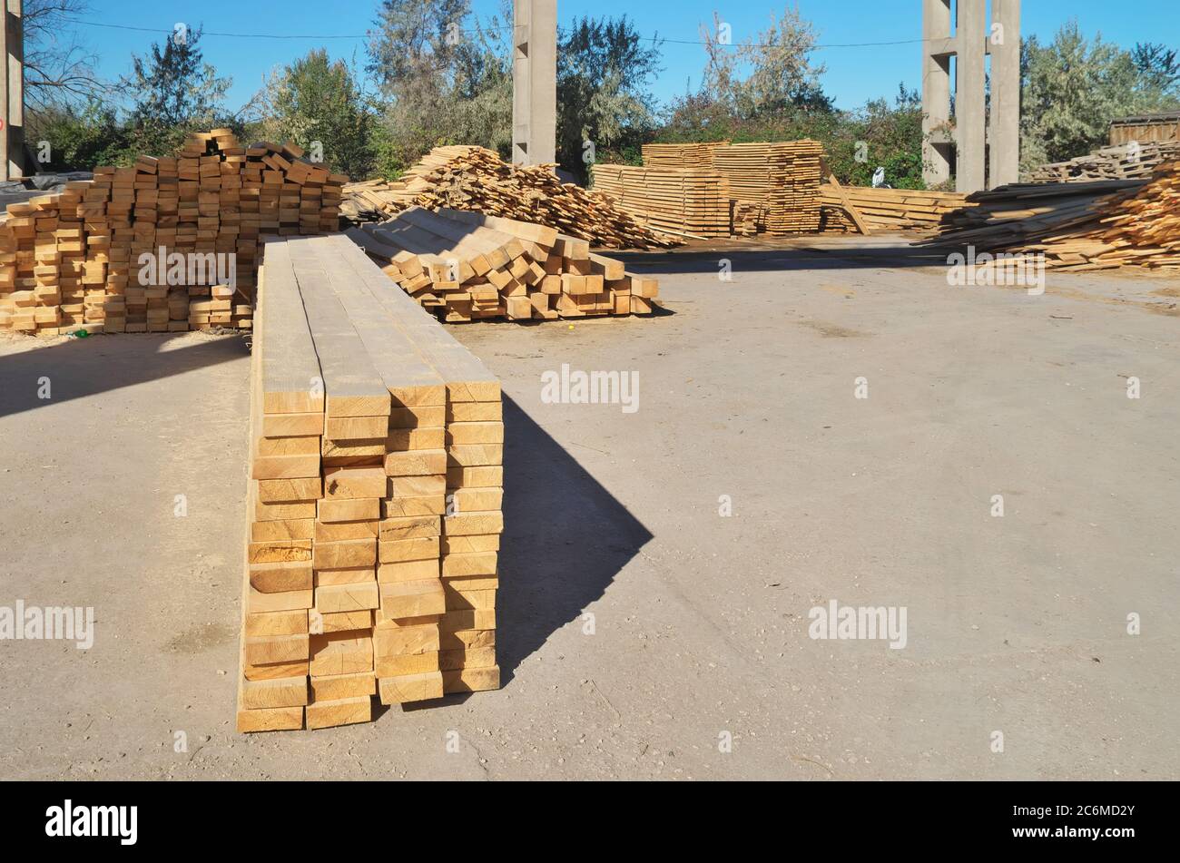 Wood in an outdoor pine wood warehouse. Building industry scene Stock ...