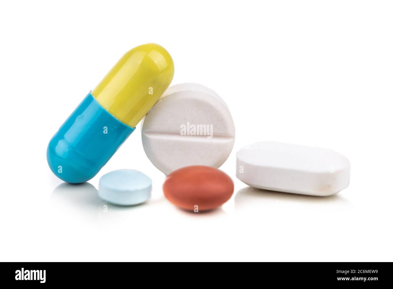 Close-up on group of medicine drug in capsule, caplet, tablet format on ...