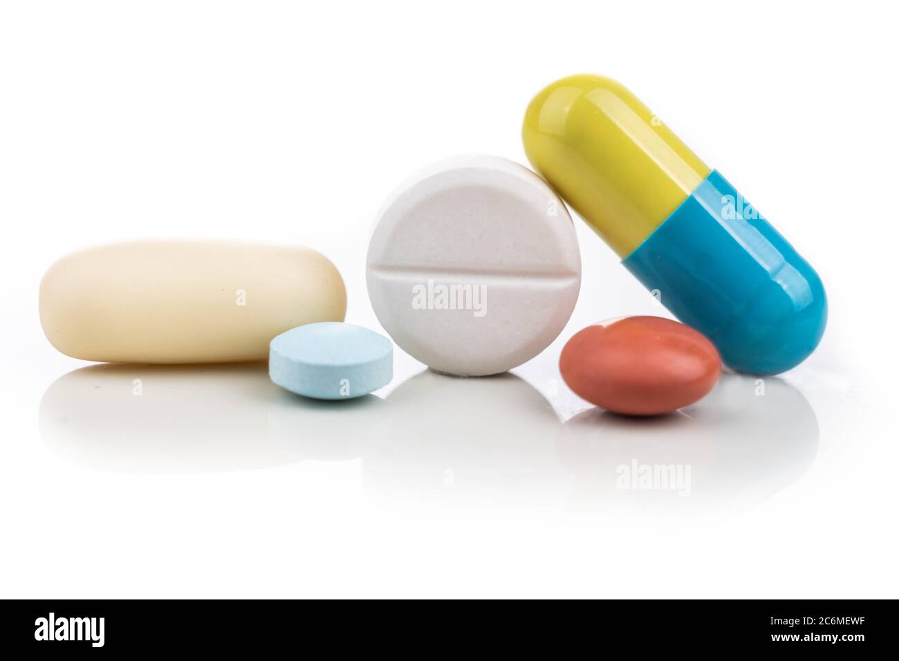 Close-up on group of medicine drug in capsule, caplet, tablet format on ...