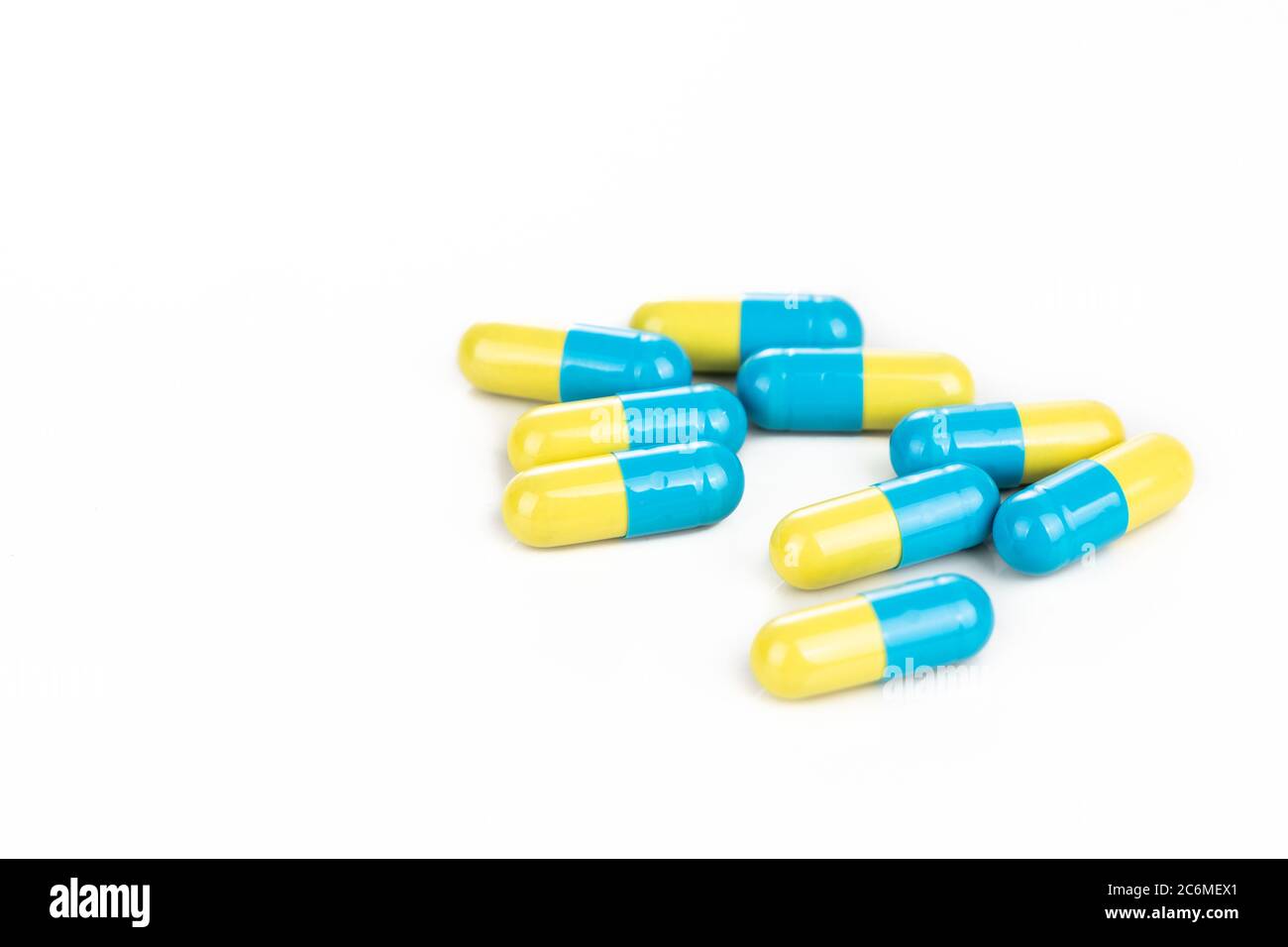 Close-up of group medicine drug in capsule format on white background ...