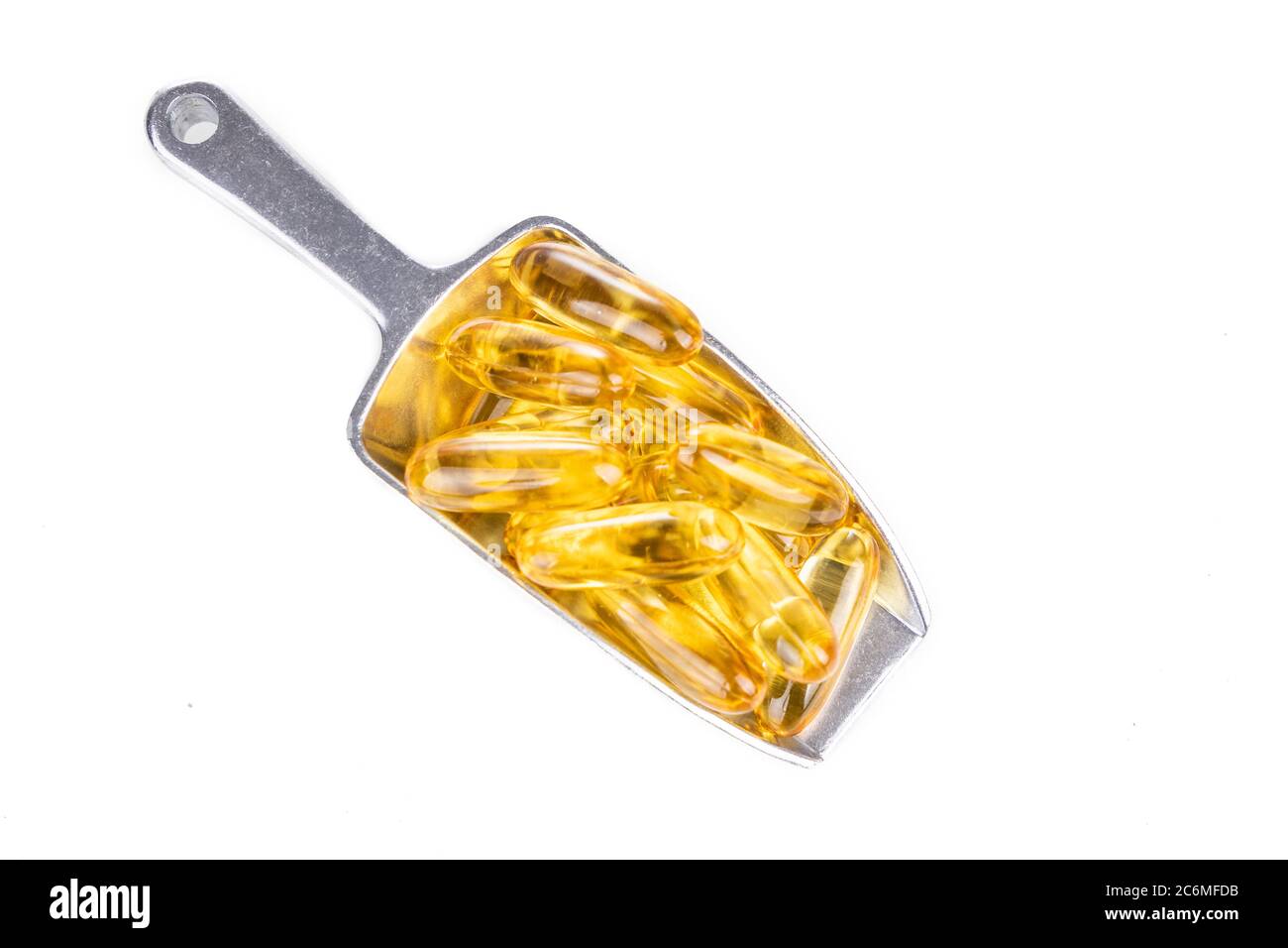 Scoop of fish oil gel capsule containing omega-3 polyunsaturated acid ...