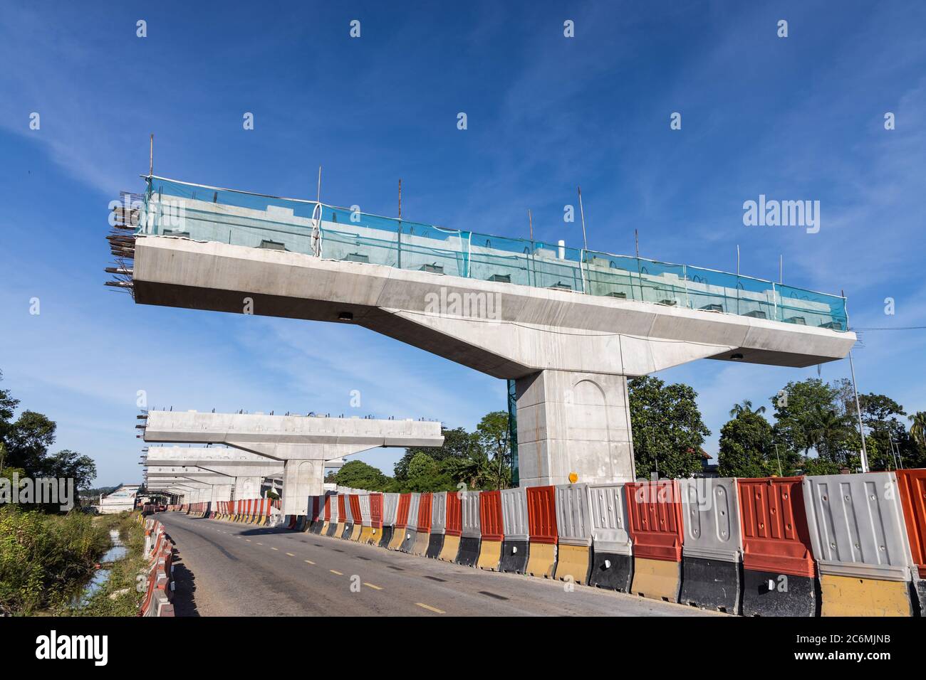 Construction of highway overpass bridge infrastructure in progress with ...