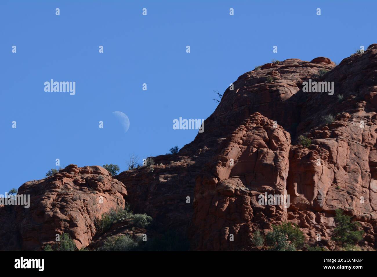 Red rocks in Sedona Arizona with moon in the background Stock Photo - Alamy