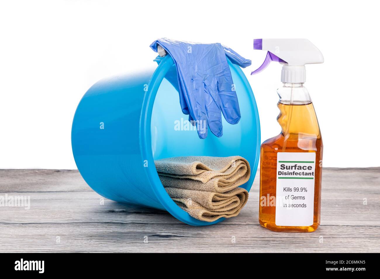 Surface disinfectant spray with pail, gloves and cloth. Complete ...